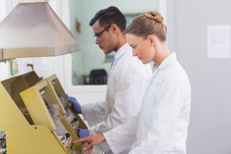 Scientists Using Technology for Research Stock Image - Image of looking ...