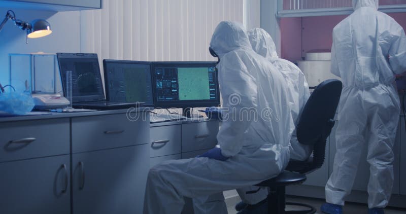 Scientists Watching Monitor in Laboratory Stock Photo - Image of ...