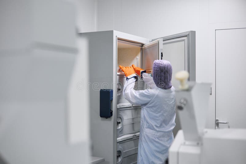 Scientists Work in the Laboratory. Remove the Biomaterial from the ...