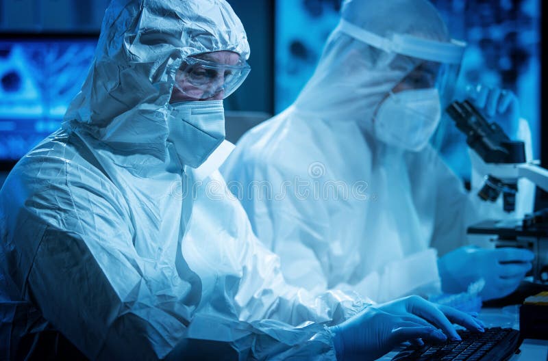 Scientists Work in a Modern Scientific Lab Using Laboratory Equipment ...