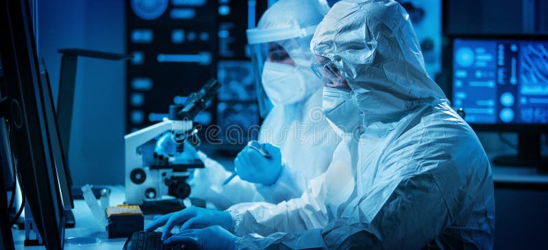 Scientists Work in a Modern Scientific Lab Using Laboratory Equipment ...