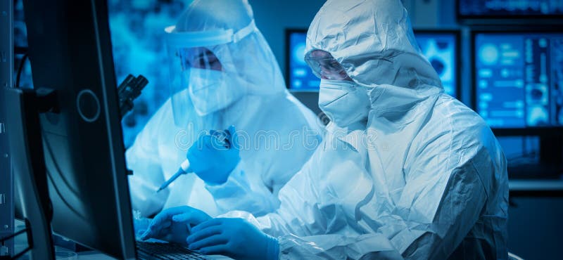 Scientists Work in a Modern Scientific Lab Using Laboratory Equipment ...