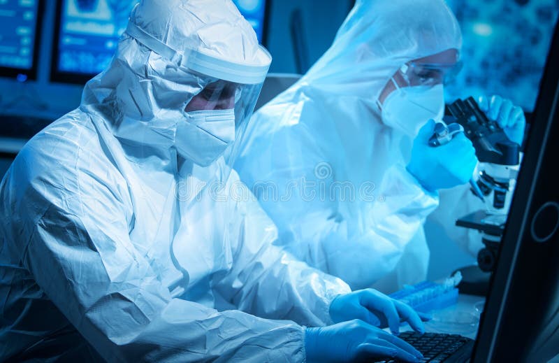 Scientists Work in a Modern Scientific Lab Using Laboratory Equipment ...