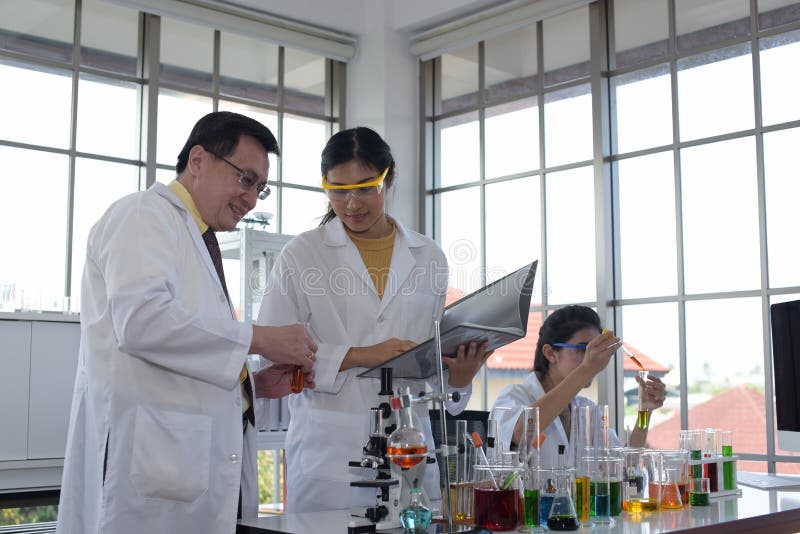 Scientists Working in Laboratory Stock Photo - Image of person, student ...
