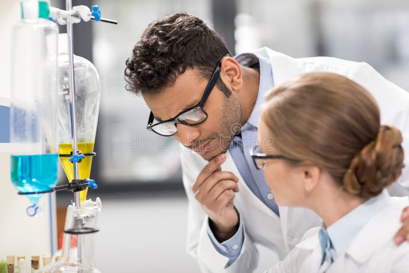 Scientists Working in Laboratory Stock Photo - Image of experiment ...