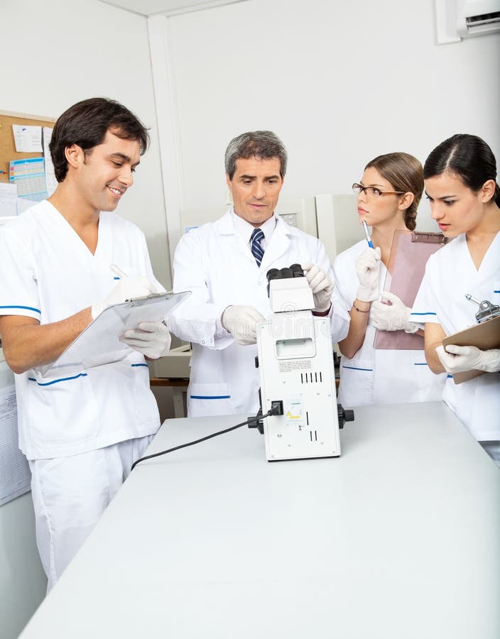 Scientists Working in Medical Laboratory Stock Image - Image of ...