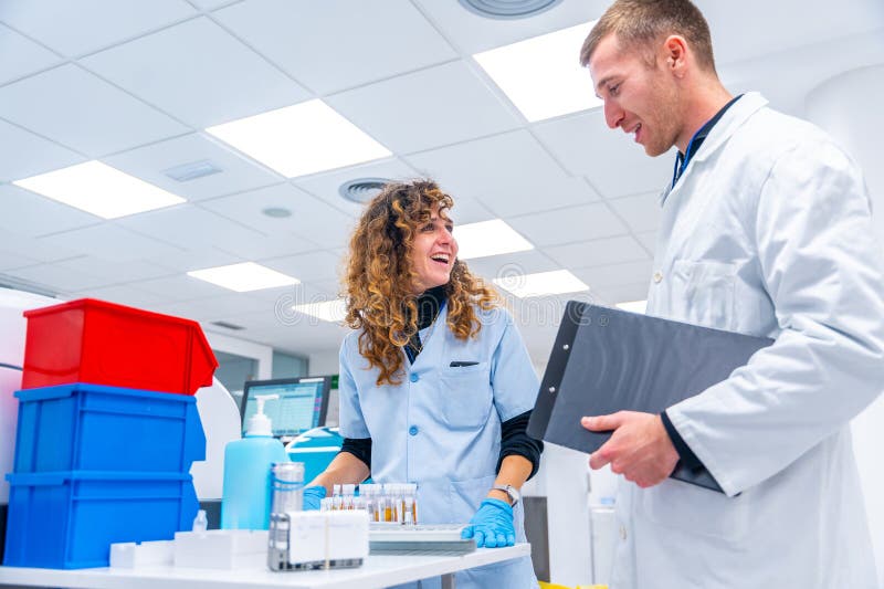 Scientists Working with Samples in a Pathology Research Laboratory ...