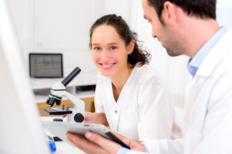 Scientists Working Together in a Laboratory Stock Image - Image of ...