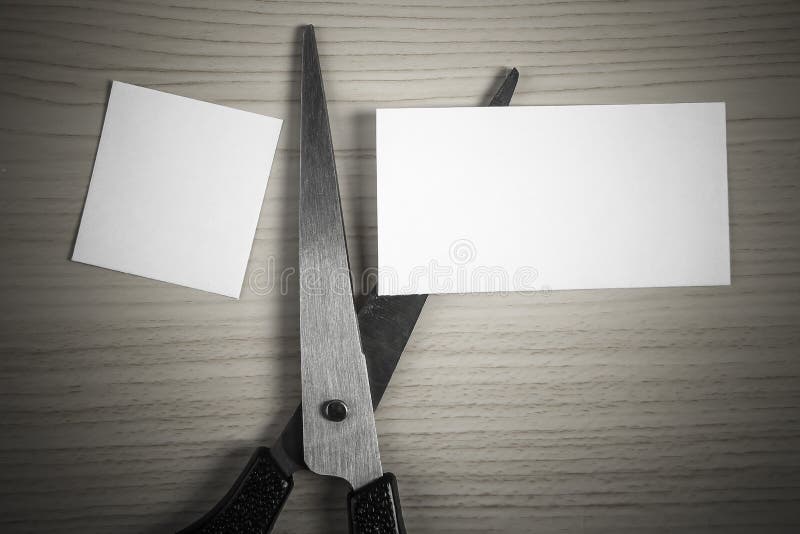 Scissor cut white paper stock image. Image of cross, reduction - 52780655