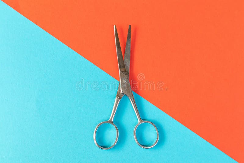 Scissors on Blue and Red Color Paper Texture Background. Stock Photo ...