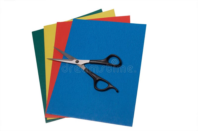 Scissors on colored paper stock photo. Image of paper - 4426314