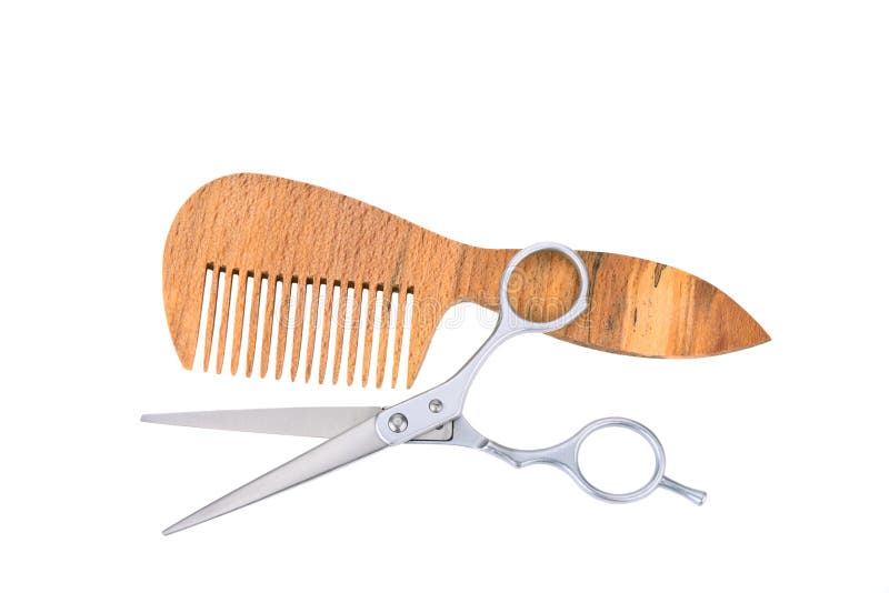 Scissors and a wooden comb stock photo. Image of fashion - 47504000