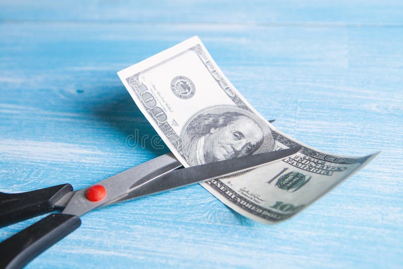 Scissors Cut a Dollar Bill in Half Stock Photo - Image of cost, price ...