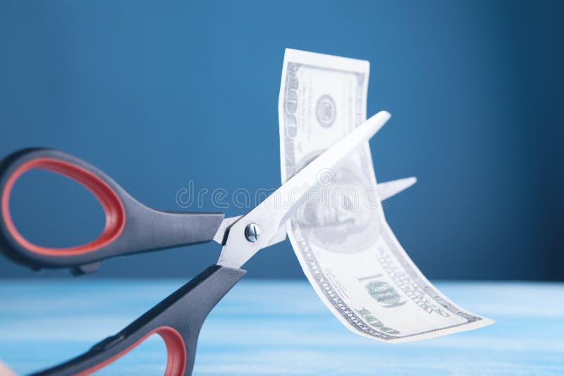 Scissors Cut a Dollar Bill in Half Stock Photo - Image of economics ...