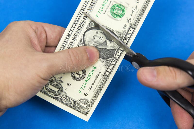 Scissors cut a dollar. stock photo. Image of concepts - 105356482
