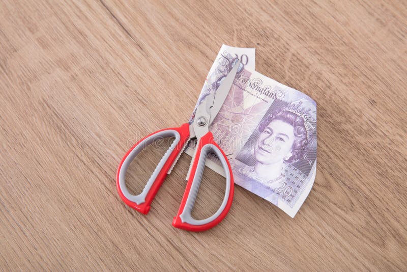 Scissors and Cut Pound Banknotes Editorial Photo - Image of cuts, pound ...