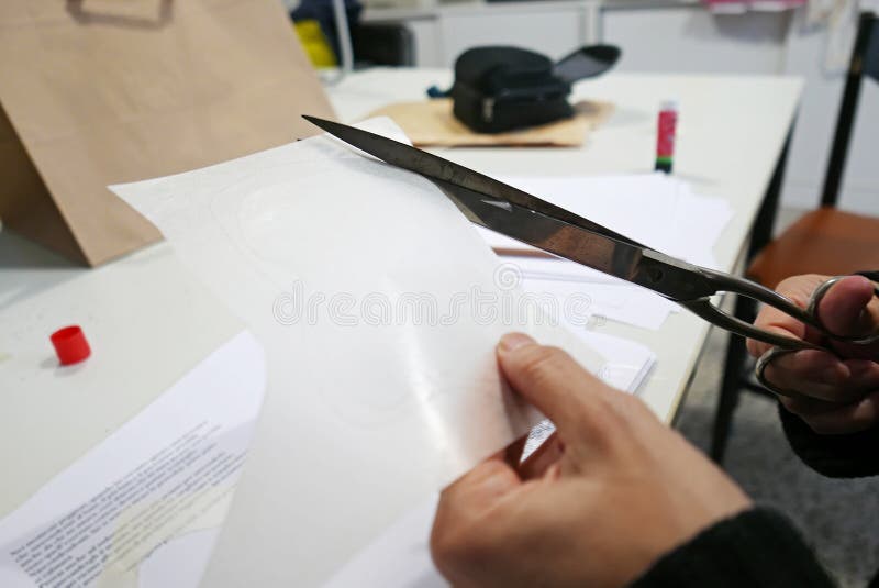 Scissors cutting paper stock image. Image of handicraft - 235619329
