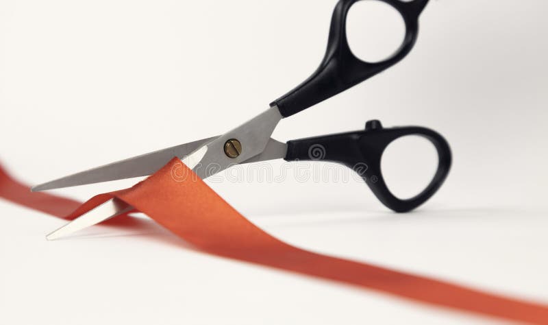 Scissors Cutting a Red Ribbon Isolated on a White Background. Opening ...