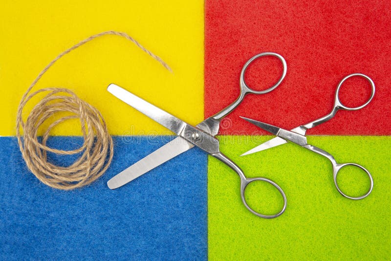 Scissors for Cutting and Rope on a Colored Background Stock Image ...