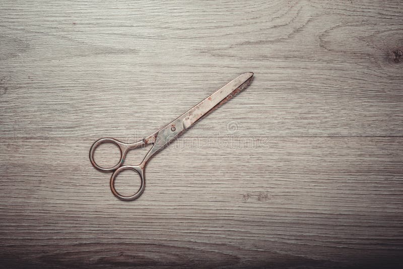 Scissors Sits on a Wood Table Stock Photo - Image of iron, distressed ...
