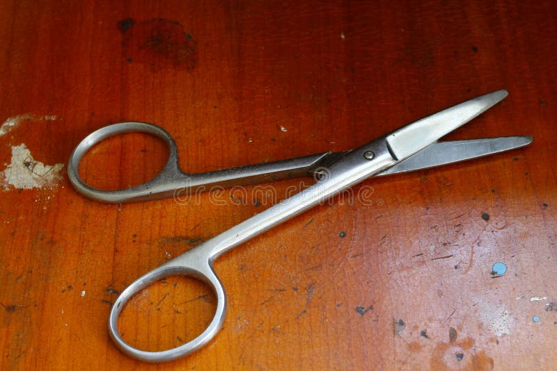 The scissors on the table stock image. Image of metal - 130474923