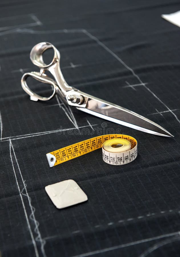 Scissors and Tape Measure on Fabric in Studio Stock Image - Image of ...