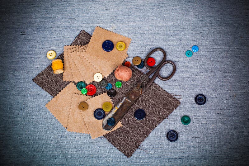 Scissors, Threads, Buttons, Pieces of Felt and Fabric on a Gray ...