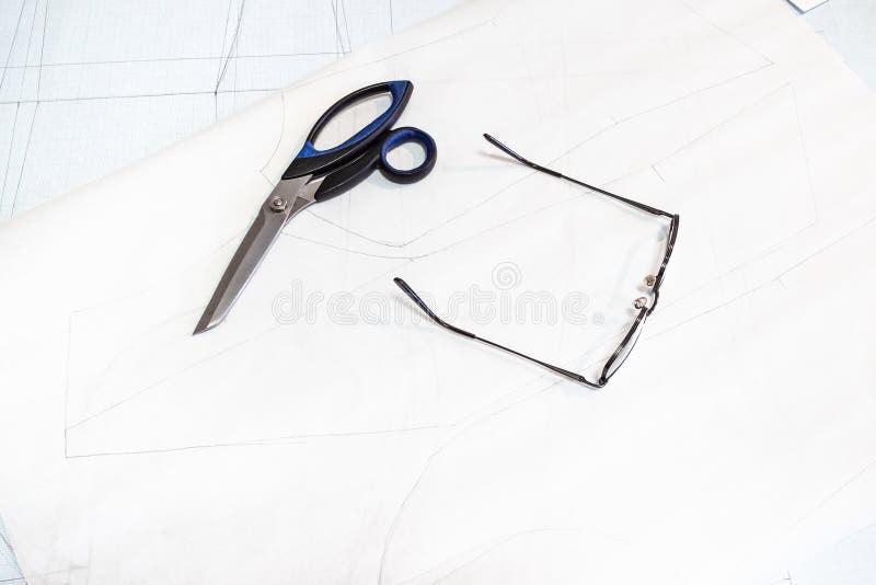 Scissors on Tracing Paper with Pattern of Dress Stock Image - Image of ...