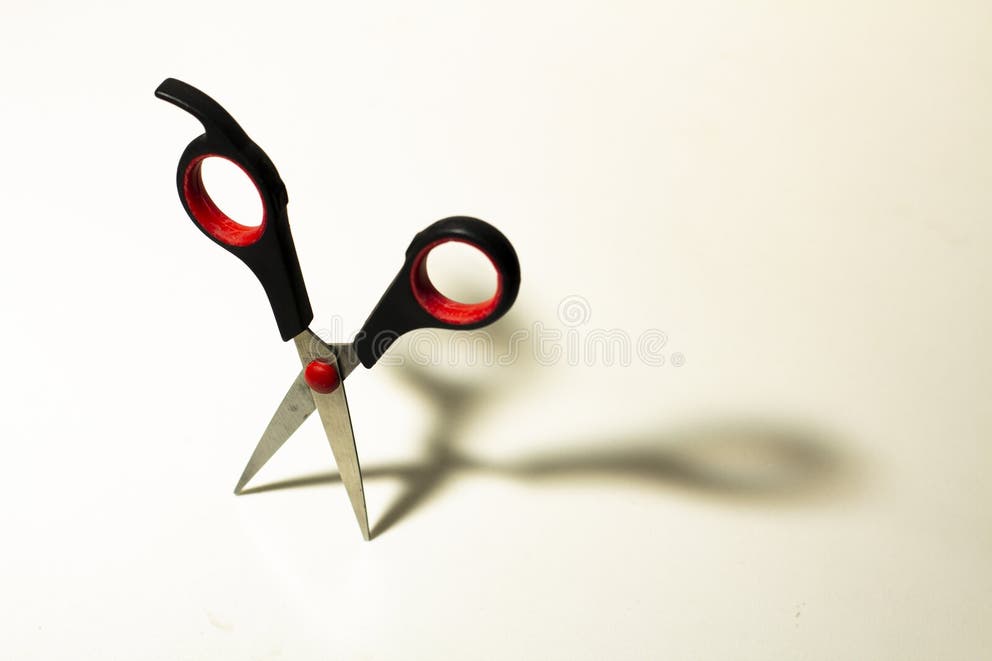 Scissors in an Upright Position Producing a Spectacular Shadow with ...