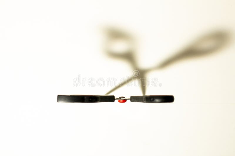 Scissors in an Upright Position Producing a Spectacular Shadow with ...