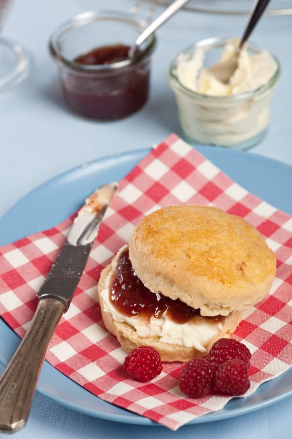 Scone with Clotted Cream and Raspberry Jam Stock Image - Image of meal ...