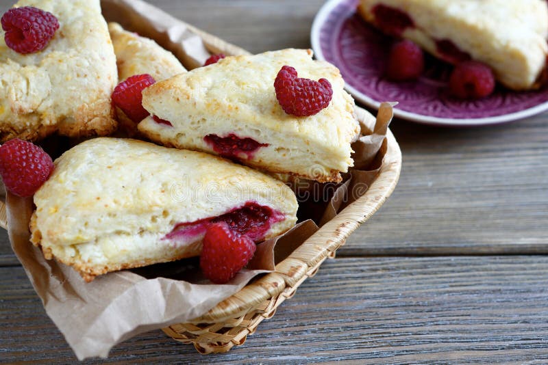 Scone with Raspberry in a Wicker Basket Stock Photo - Image of scones ...