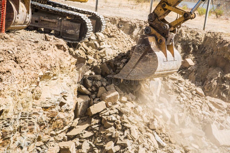 Scoop of an Excavator, Digger Removing Rocks Stock Image - Image of ...