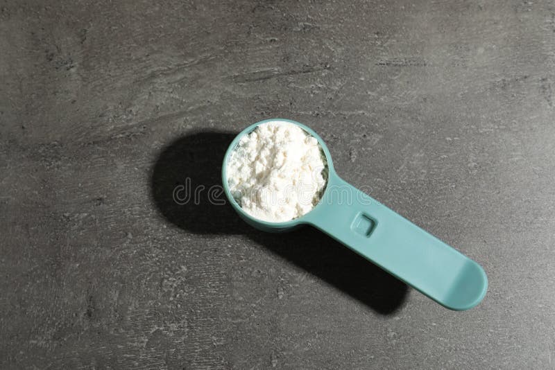 Scoop of Protein Powder on Grey Background Stock Photo - Image of ...