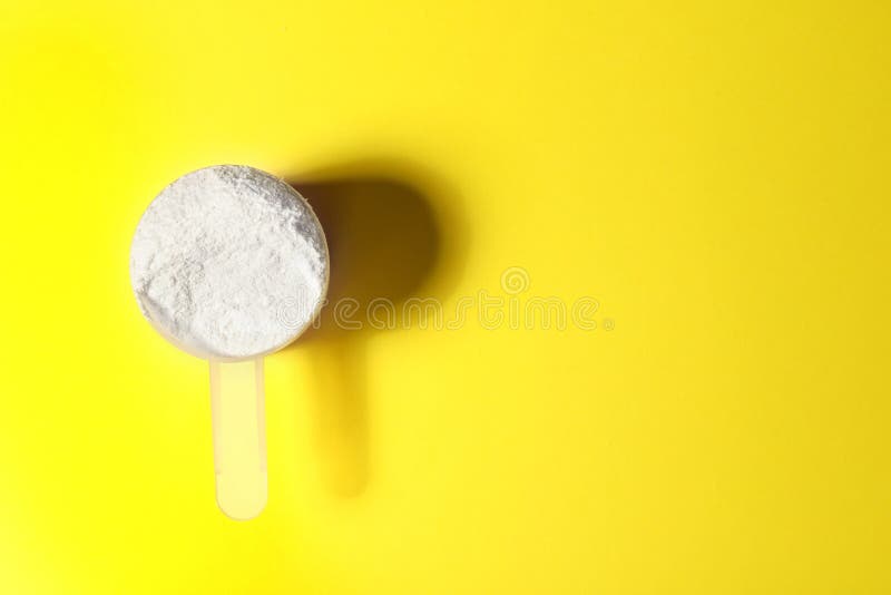 Scoop of Protein Powder on Yellow , Top View with Space for Text Stock ...