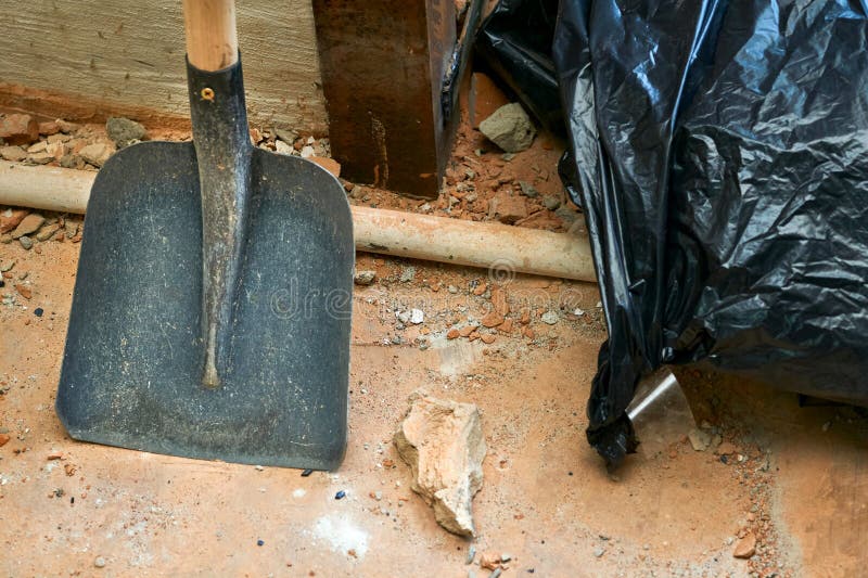 Scoop Shovel on Garbage Collection at Construction Site, Repair Stock ...