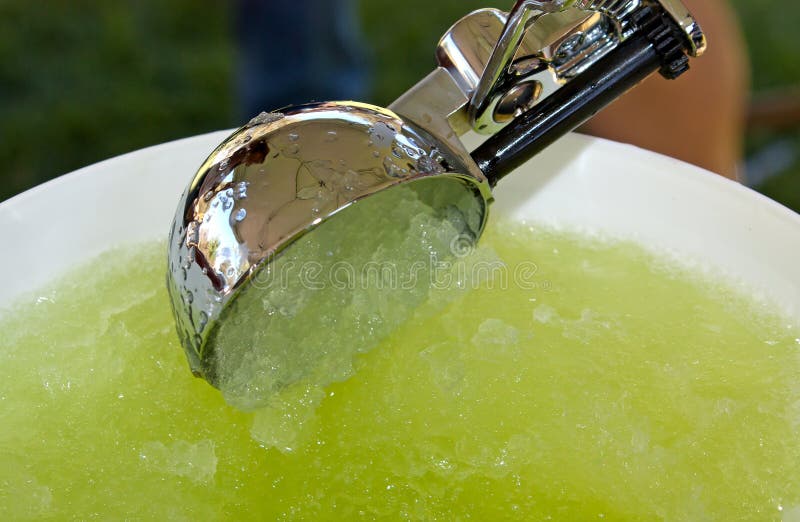 Scooping Frozen Margaritia Mix Stock Photo - Image of drinks, slushy ...