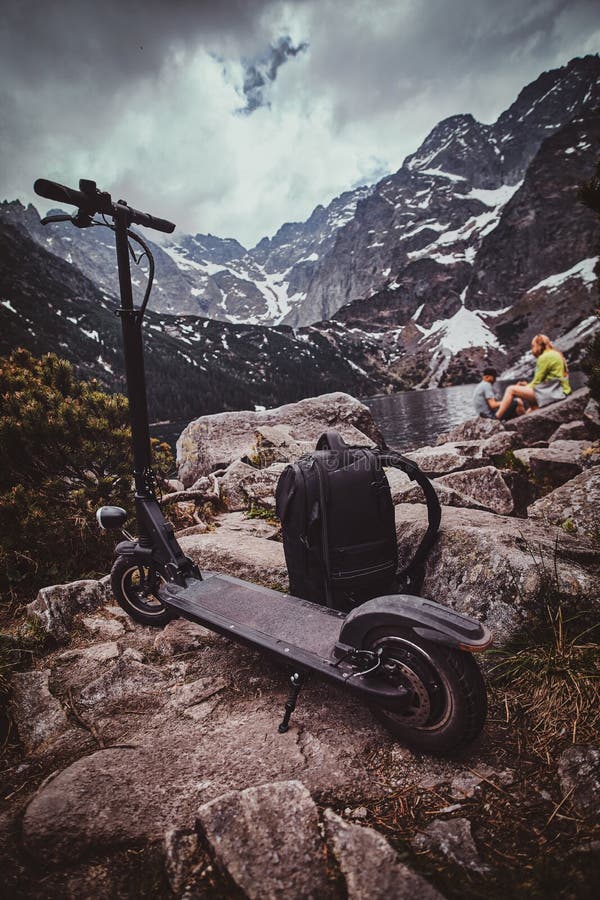 Scooter in the Beautiful Mountains with Pine and Low Clouds Stock Image ...