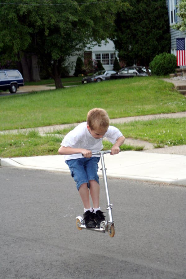 Scooter Boy in Air stock photo. Image of enjoy, casual - 11966958