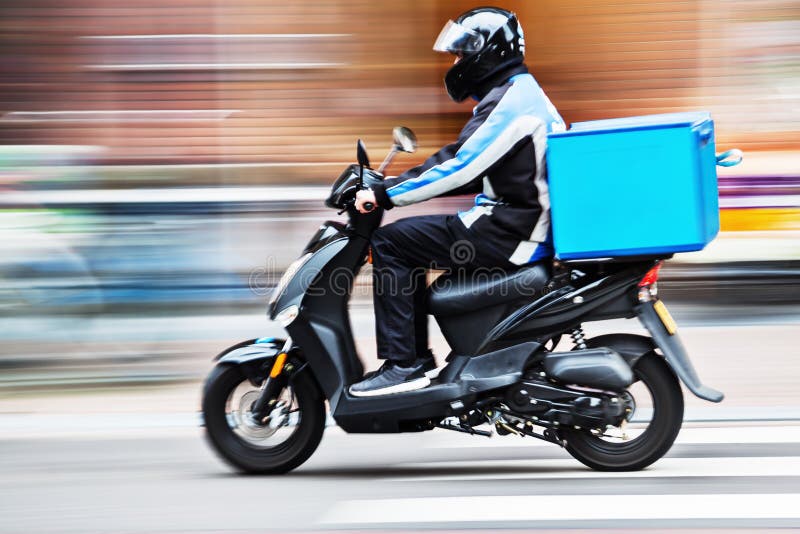 Scooter Delivery Service in Motion Blur Stock Photo - Image of motion ...