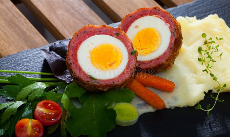 Scotch Egg Srved with Mashed Potatoes and Greens, Scottish Traditional ...