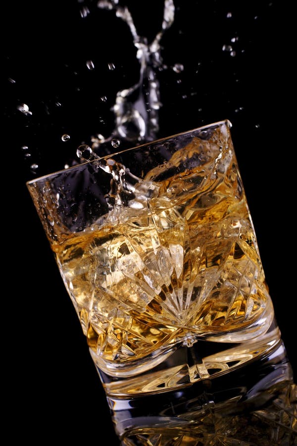 Scotch on the rocks stock photo. Image of glass, action - 3861650