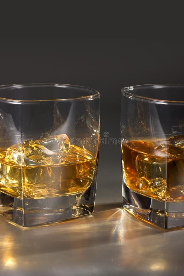 Scotch on the rocks stock image. Image of gold, irish - 6954245