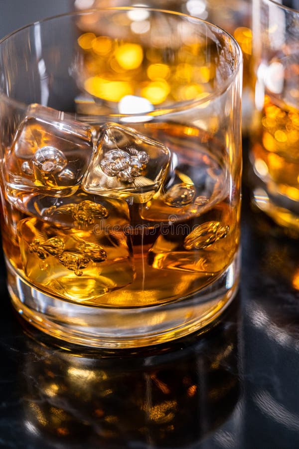 Scotch on the rocks stock image. Image of stone, glass - 282566949