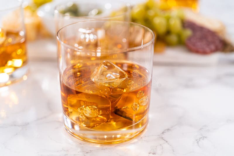 Scotch on the rocks stock photo. Image of charcuterie - 267105464