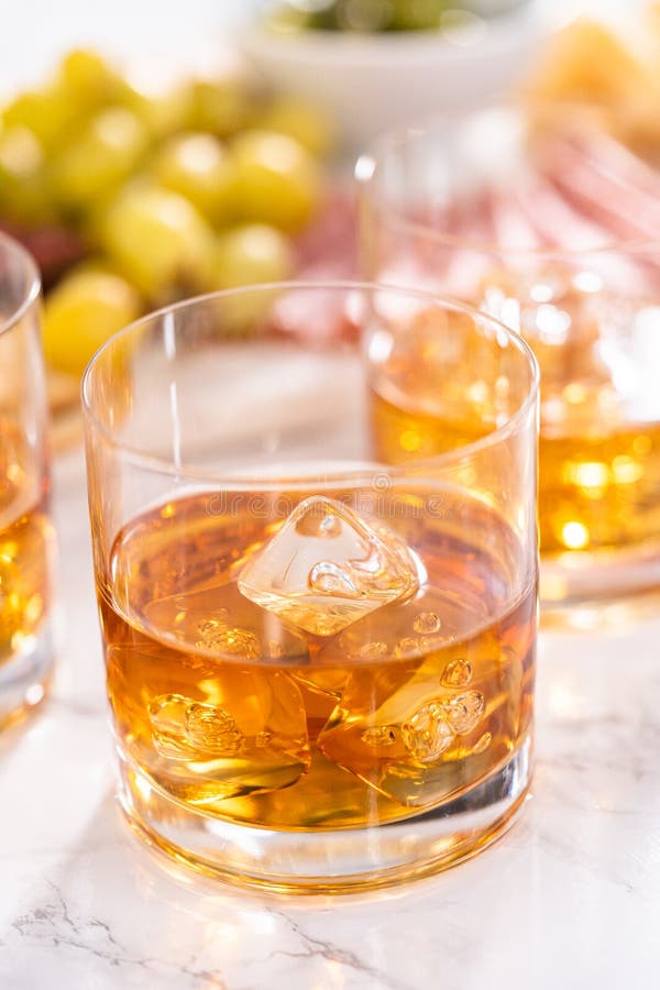 Scotch on the rocks stock image. Image of beverage, glass - 267107403