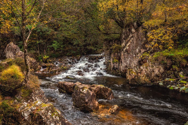 Steall Falls and tourists stock image. Image of fort - 27613685