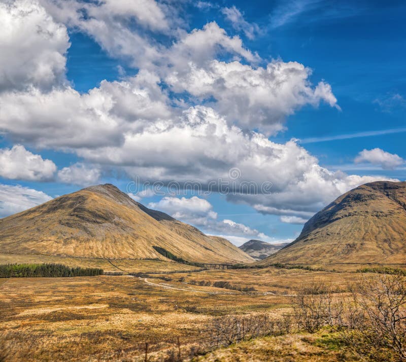 Scottish Highlands with Deep Valley Against Cloudy Sky in Scotland ...