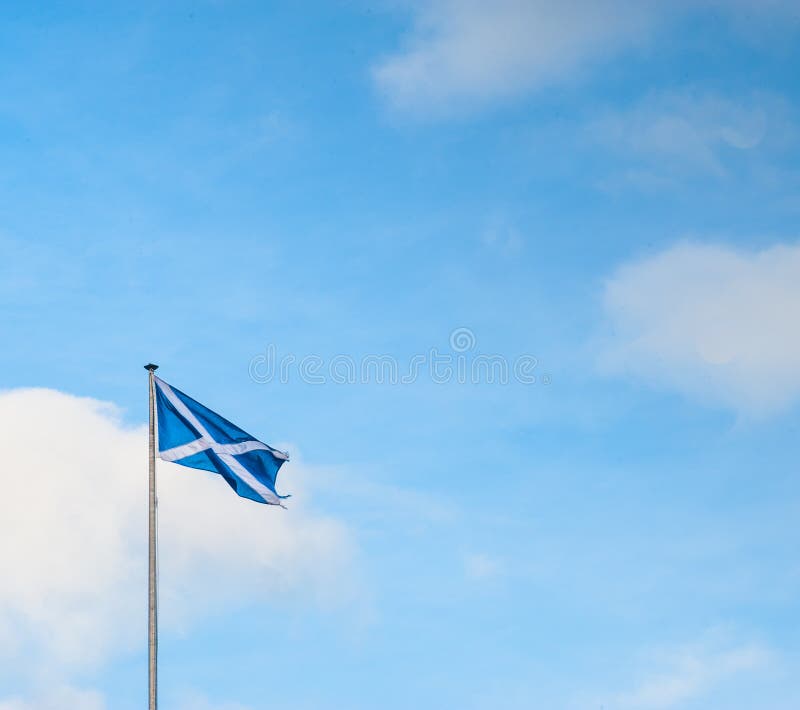 Scottish Saltire Flag on a Background of Blue Sky Stock Photo - Image ...