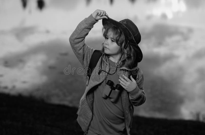 Scout Boy Wearing Explorer Hat and Backpack Outdoor. Explorer and Adventure with Binocular ...